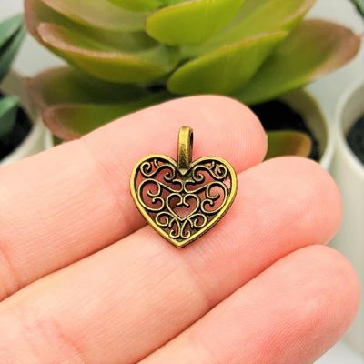20 Pcs Filigree Scroll Heart Charms | Oriental Trading