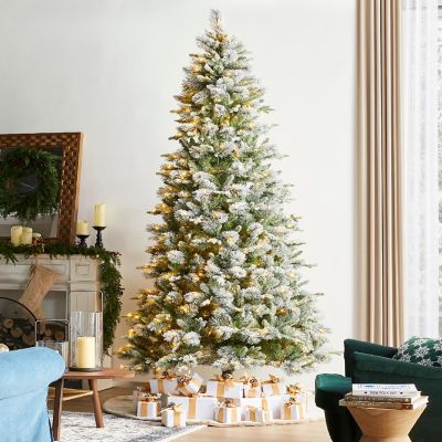 Glitzhome 9ft Pre-Lit Flocked Slim Pine Artificial Christmas Tree with 600 Warm White LED lights ...