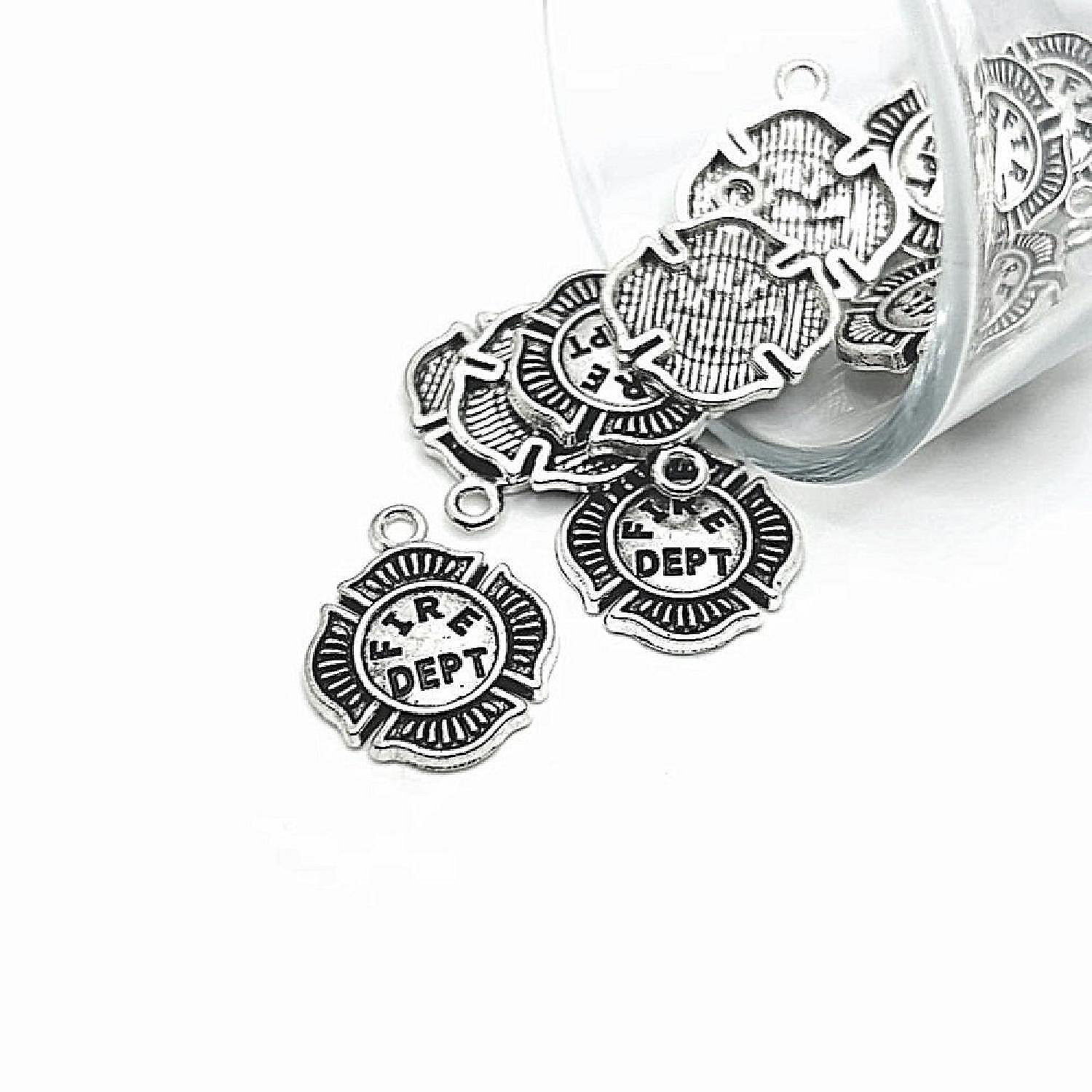 50 Pcs Silver Fireman Badge Symbol Charm | Oriental Trading
